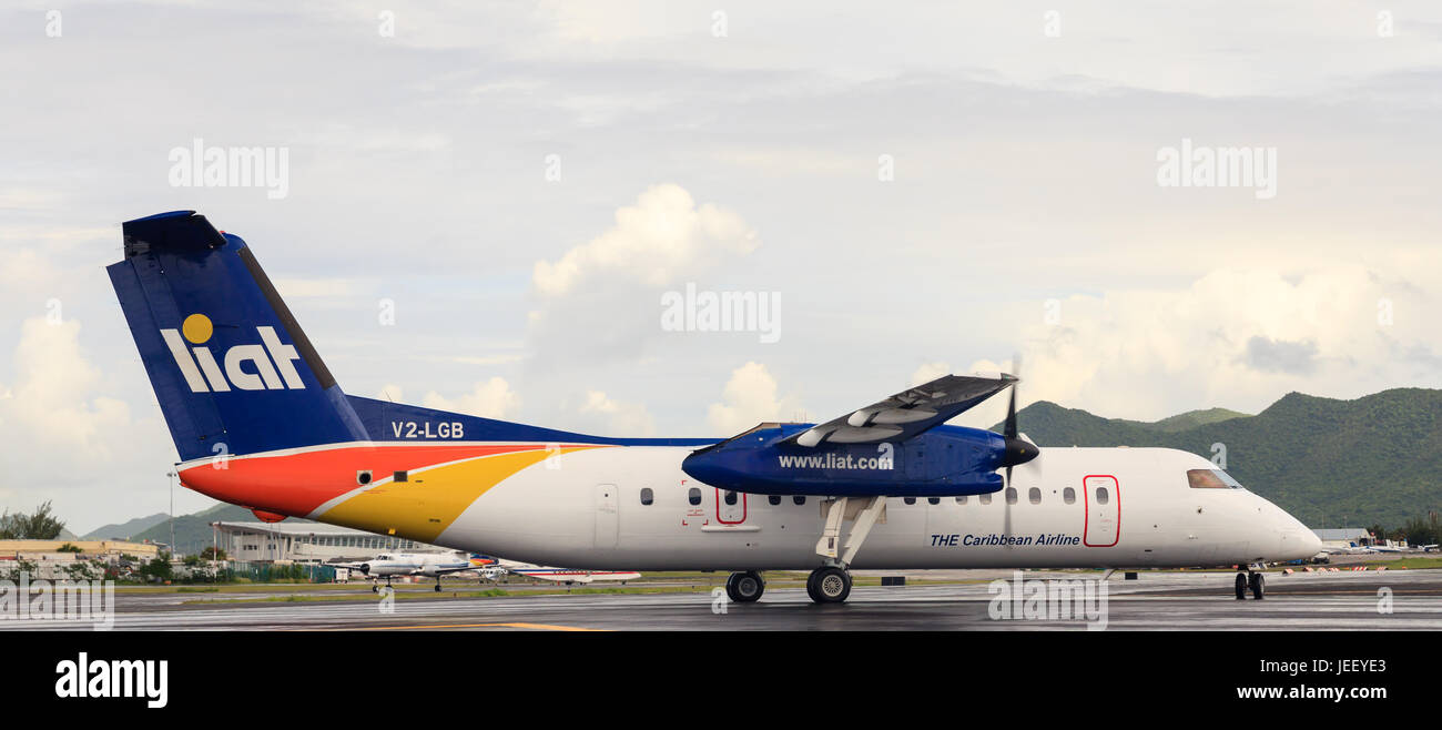 A LIAT plane prepares to take off from Princess Juliana International ...