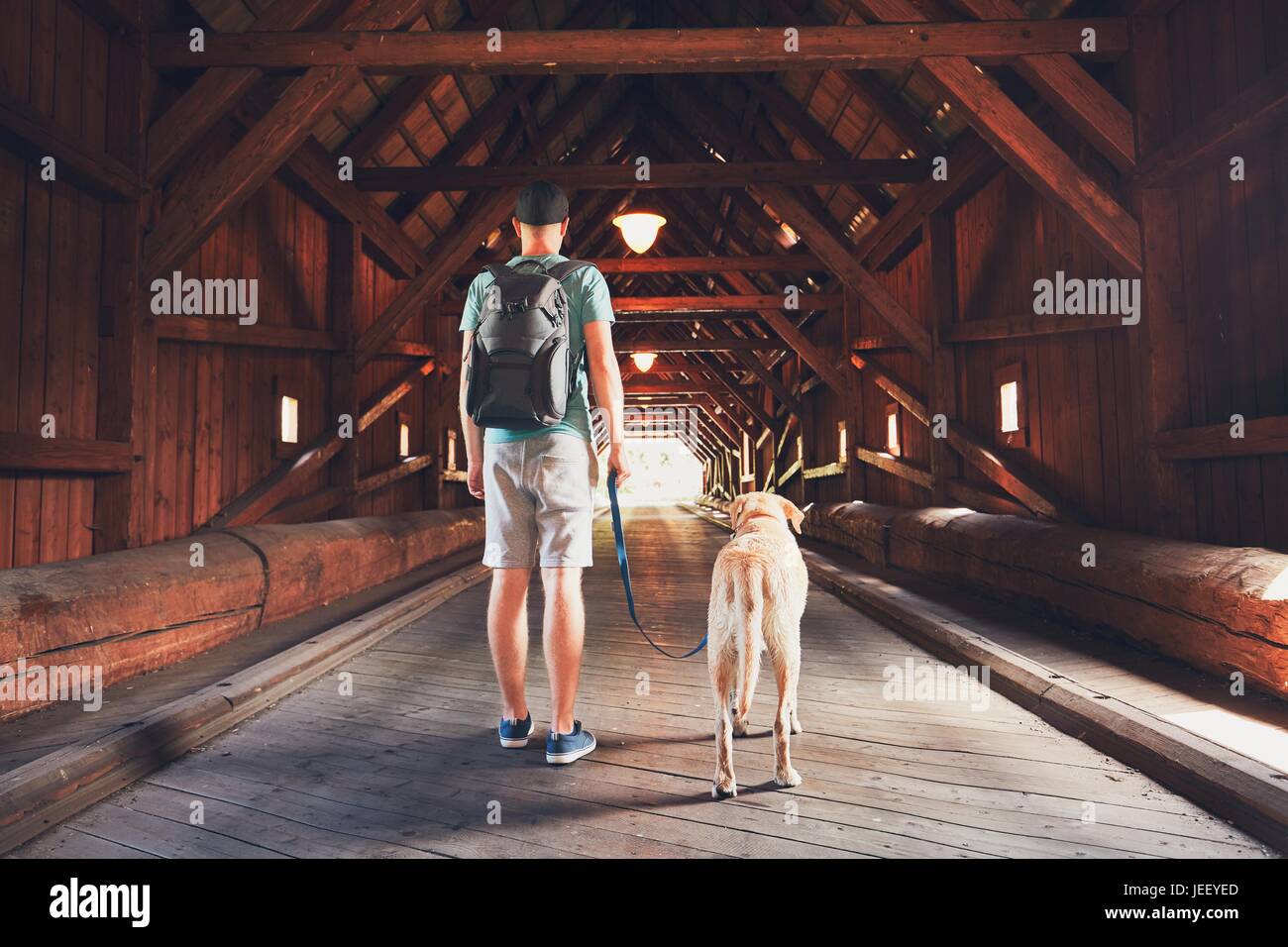 Walking dog bridge High Resolution Stock Photography and Images - Alamy