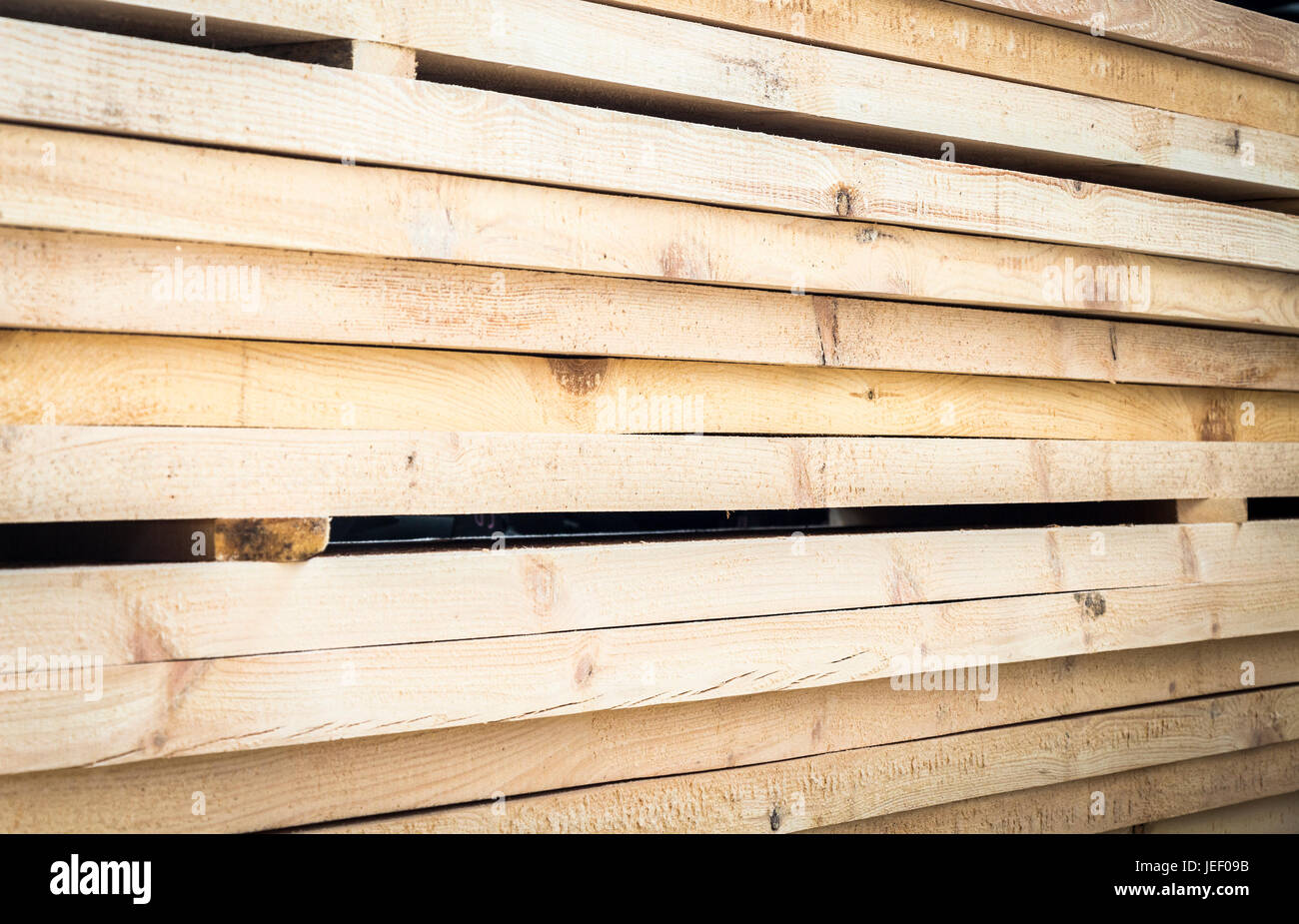A stack of construction planks close up Stock Photo - Alamy