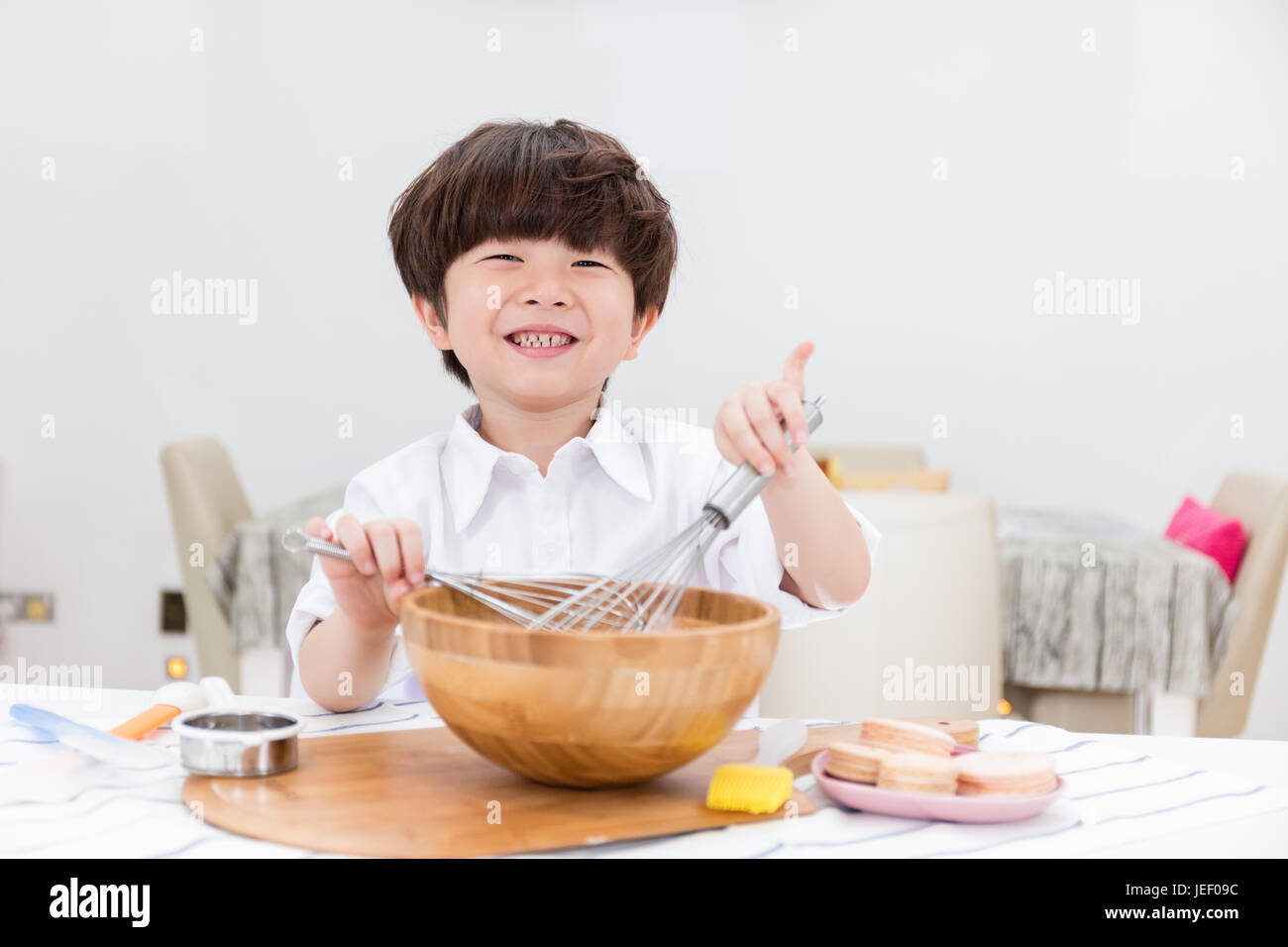 Asian Chinese little boy prepare for baking cookies at home Stock Photo ...
