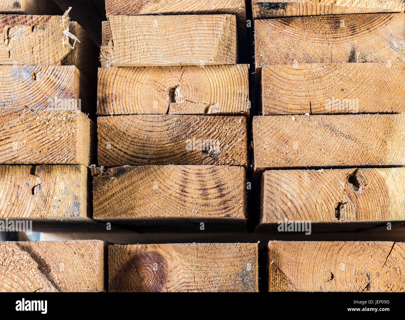 A stack of construction planks close up Stock Photo - Alamy