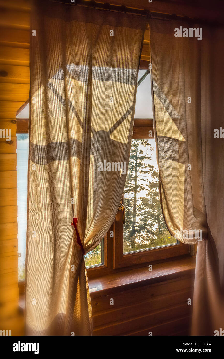 Nice view from the window of a wooden house closeup Stock Photo - Alamy