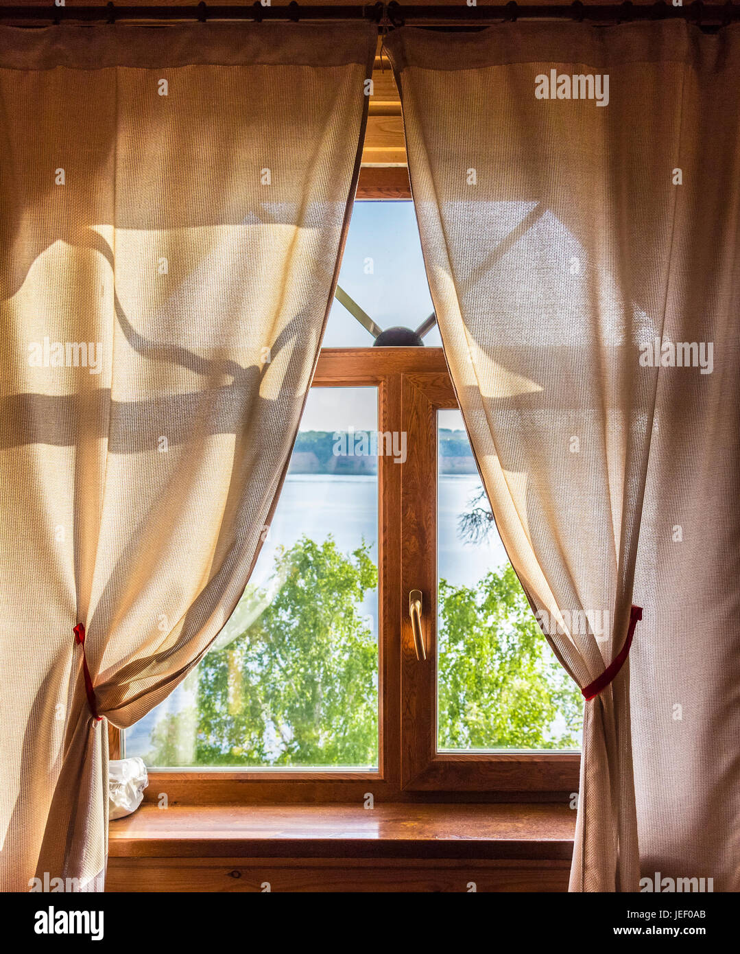 Nice view from the window of a wooden house closeup Stock Photo - Alamy