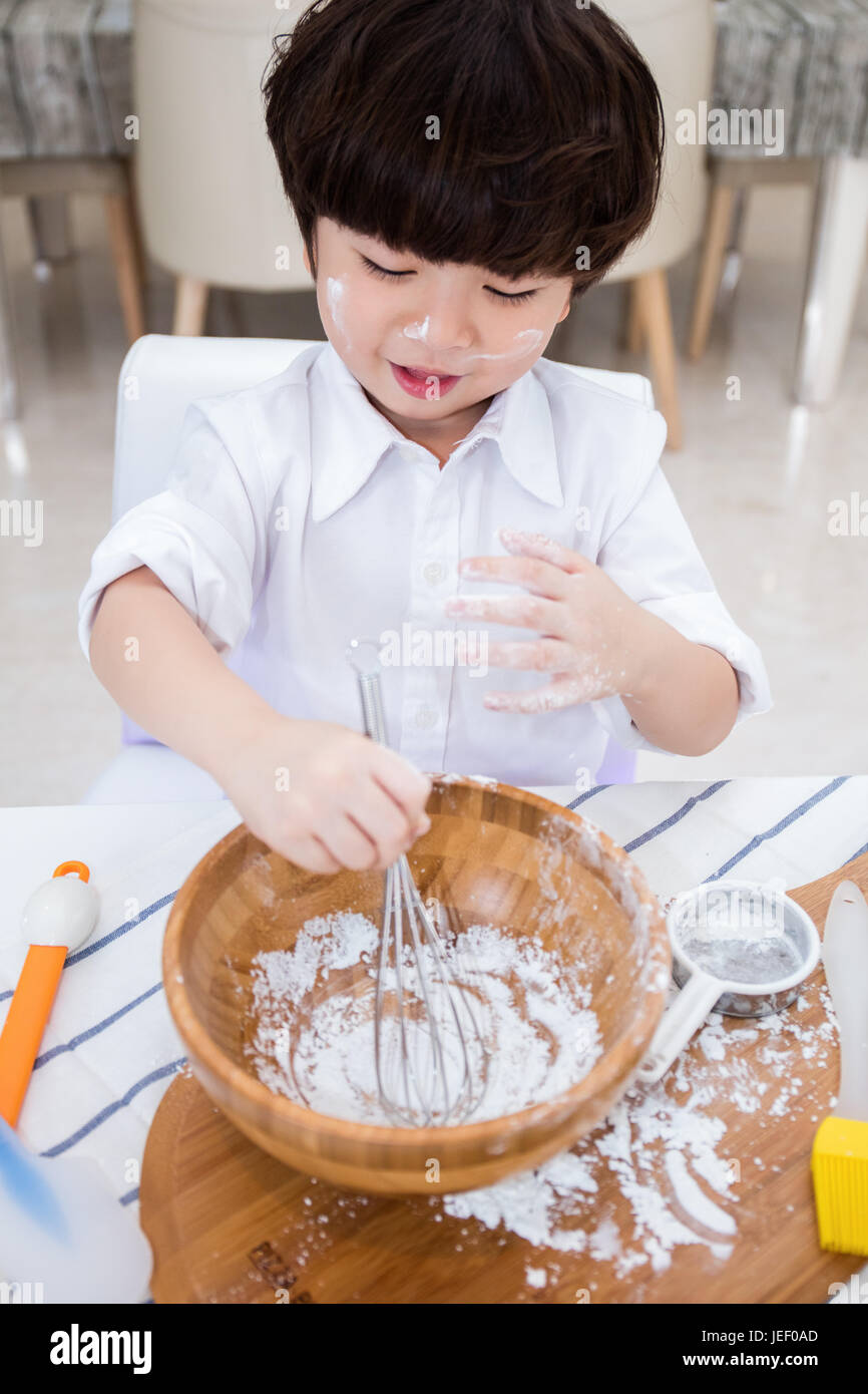 Asian Chinese little boy prepare for baking cookies at home Stock Photo ...