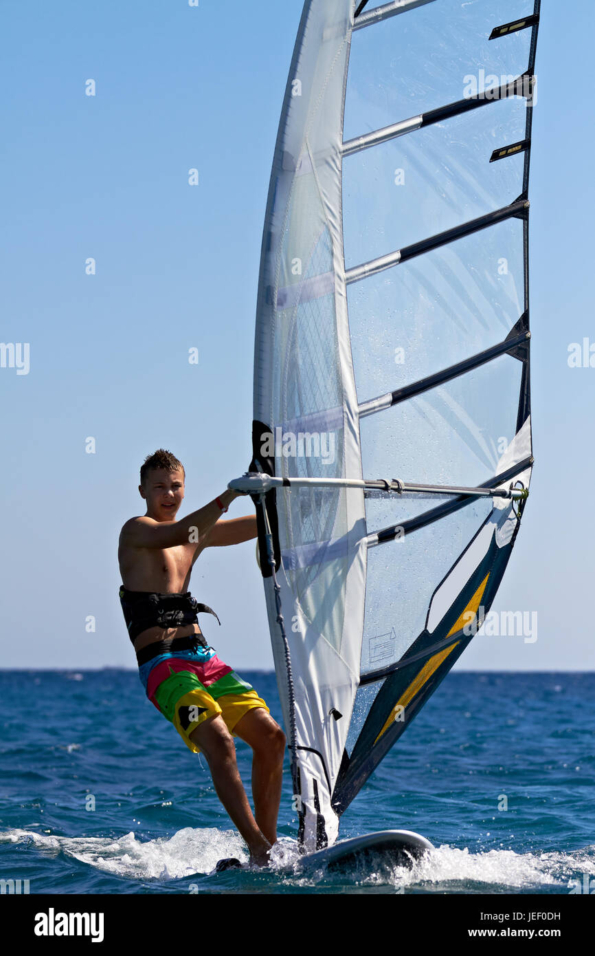 Front view of a windsurfer in action closeup Stock Photo - Alamy