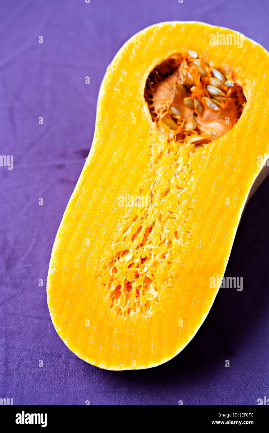 Raw cut butternut squash prepared ready to be chopped and baked Stock ...