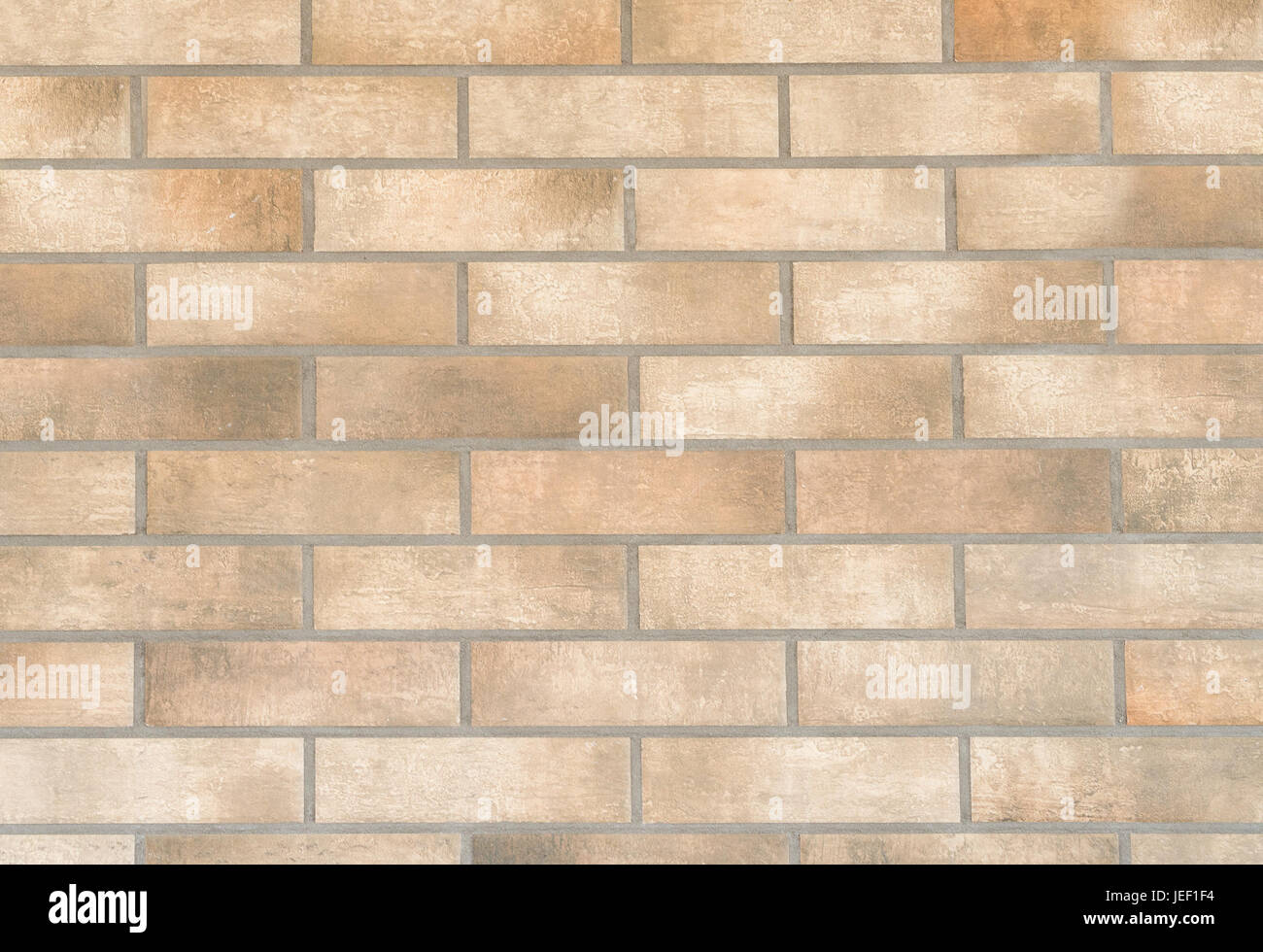 surface of beige textured brick wall background Stock Photo - Alamy