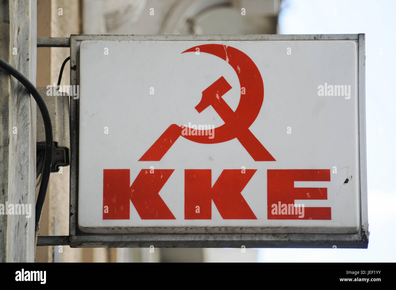 Greek Communist Party (KKE) logo on the facade of a building, in Athens ...