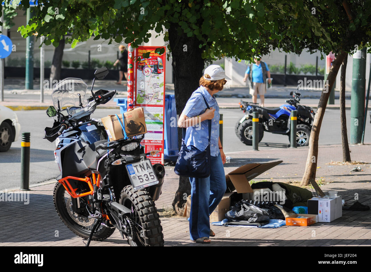 Poor and homeless migrants try to earn their living in the streets of ...