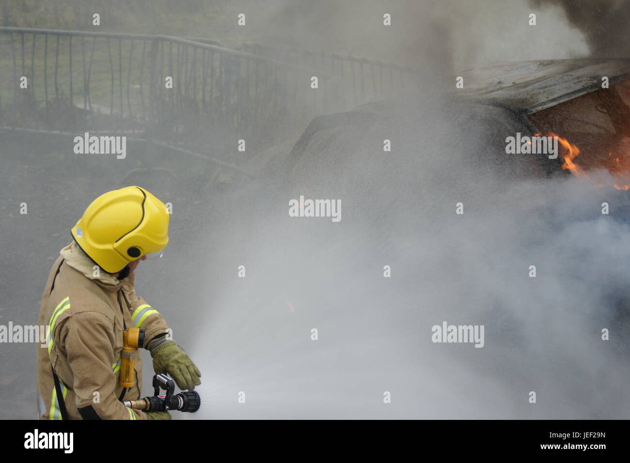 fire fighter at incident Stock Photo - Alamy