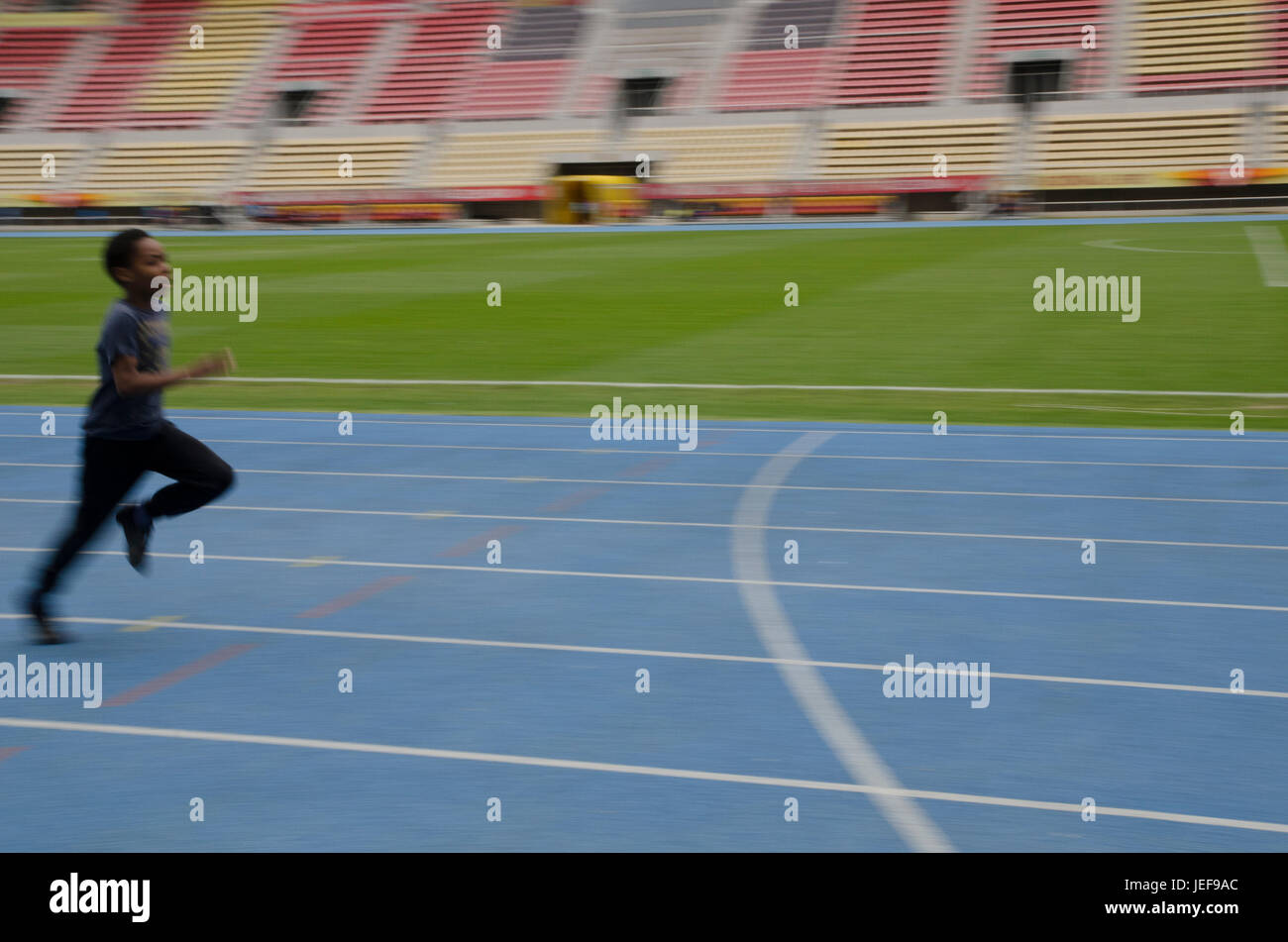 African american boy running hi-res stock photography and images - Alamy