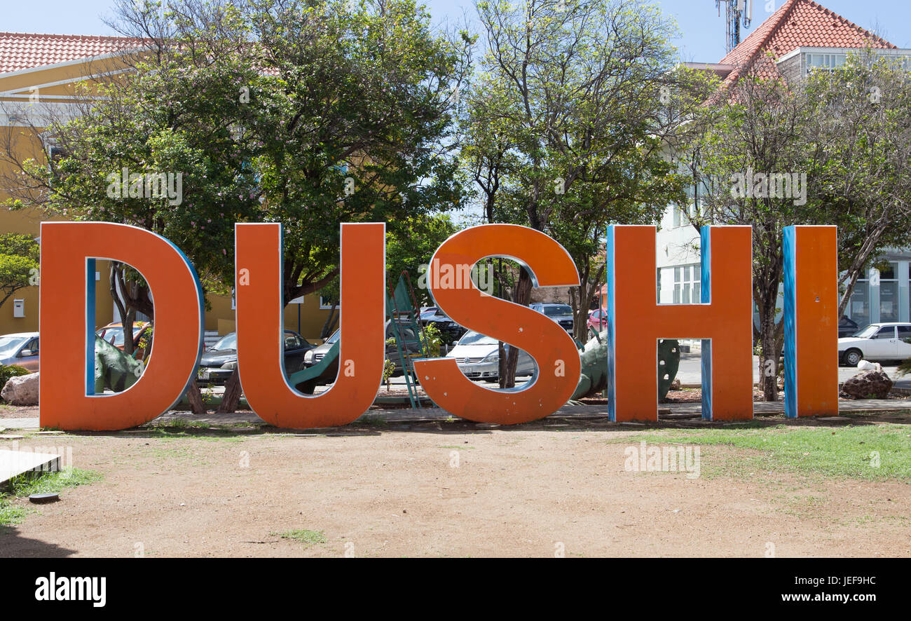 Giant Orange Dushi Sign in Curacao Stock Photo - Alamy