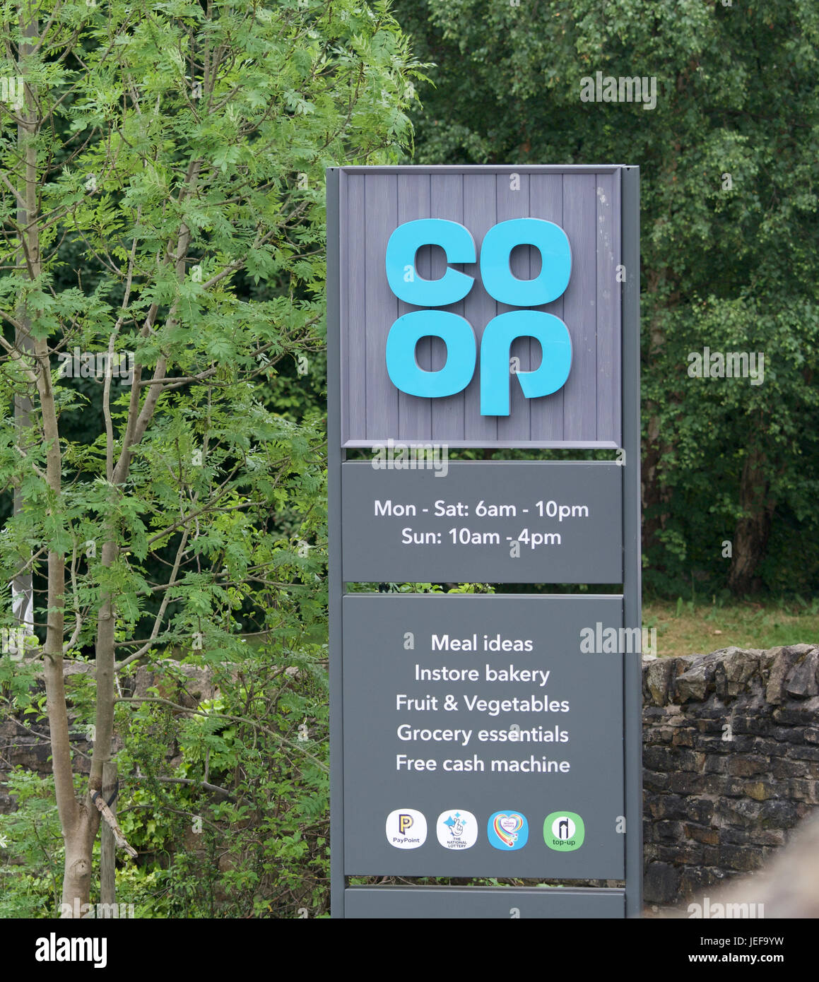 A sign showing the opening tomes of the co-op store in New Mills ...