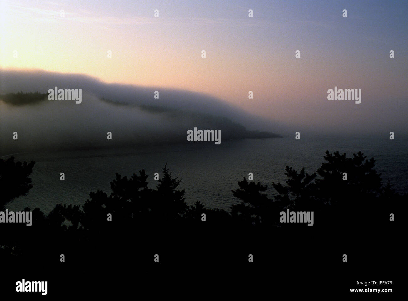 A fog rolling in -- Acadia National Park - Bar Harbor, Maine USA Stock ...