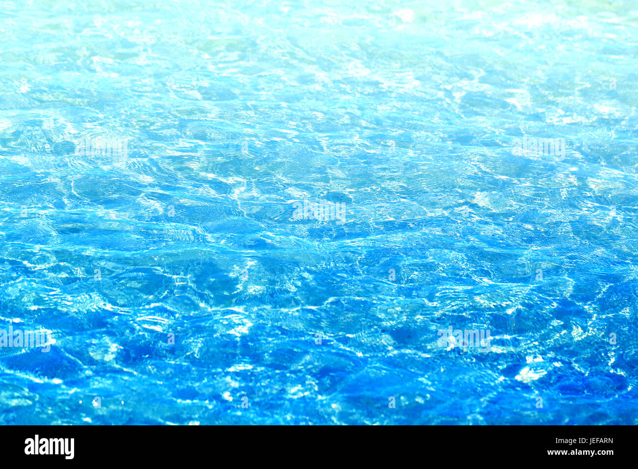 Photo of a beautiful blue sea wave on a sunny afternoon Stock Photo - Alamy