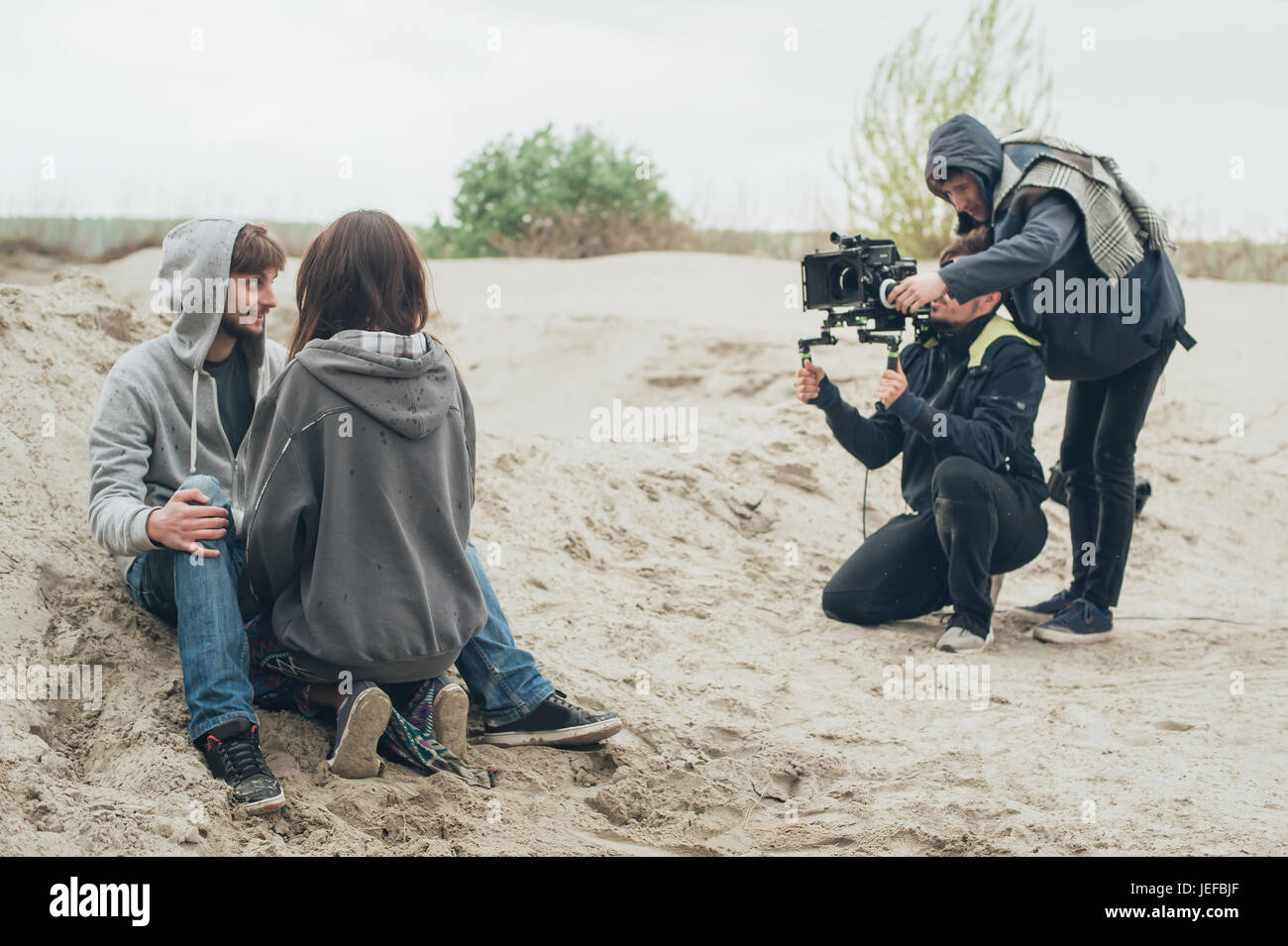 Behind the scene. Actor and actress in front of the camera on the film ...