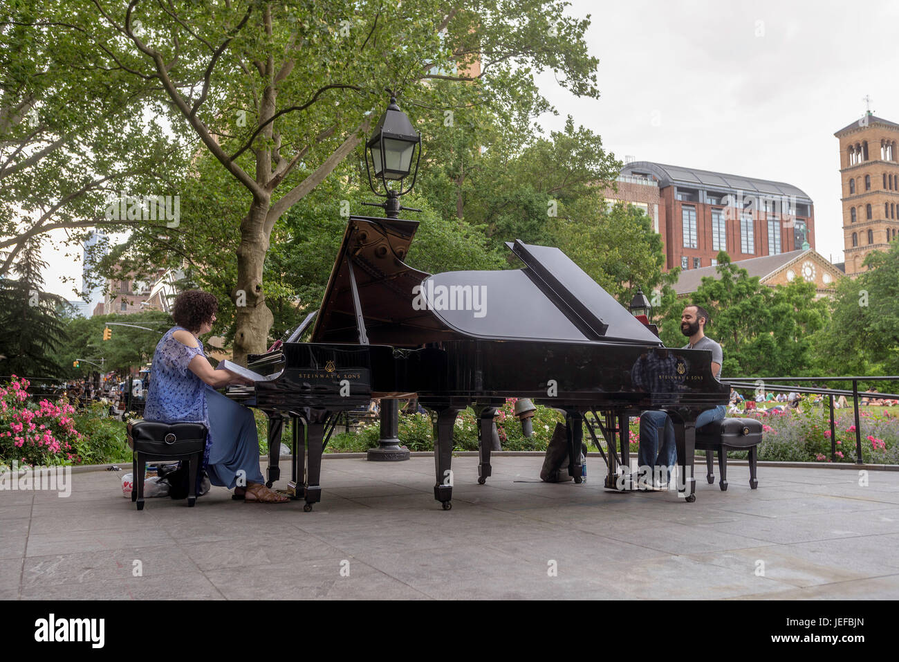 Grand piano man woman hi-res stock photography and images - Alamy