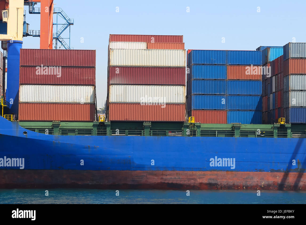 Container Ship is loading in a port Stock Photo - Alamy