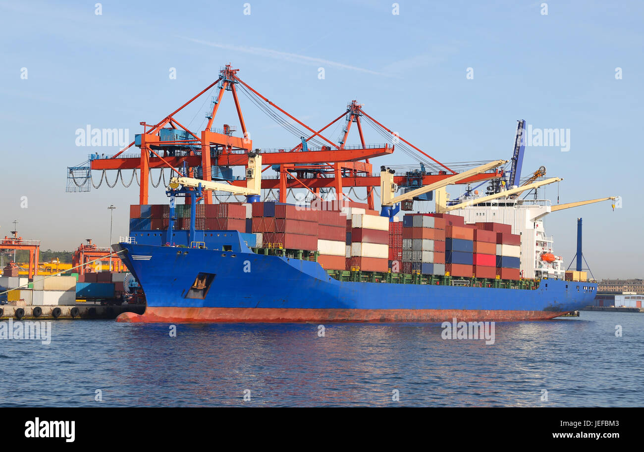Container Ship is loading in a port Stock Photo - Alamy