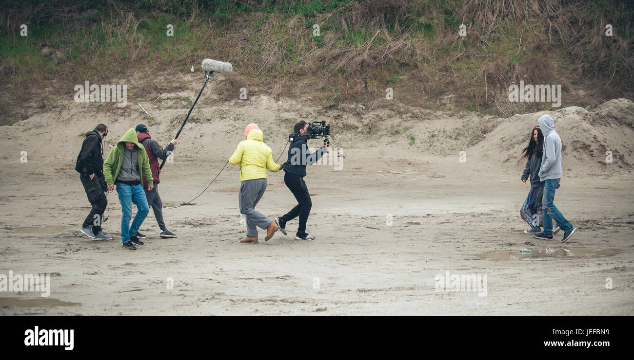 Behind the scene. Film crew team filming movie scene on outdoor ...