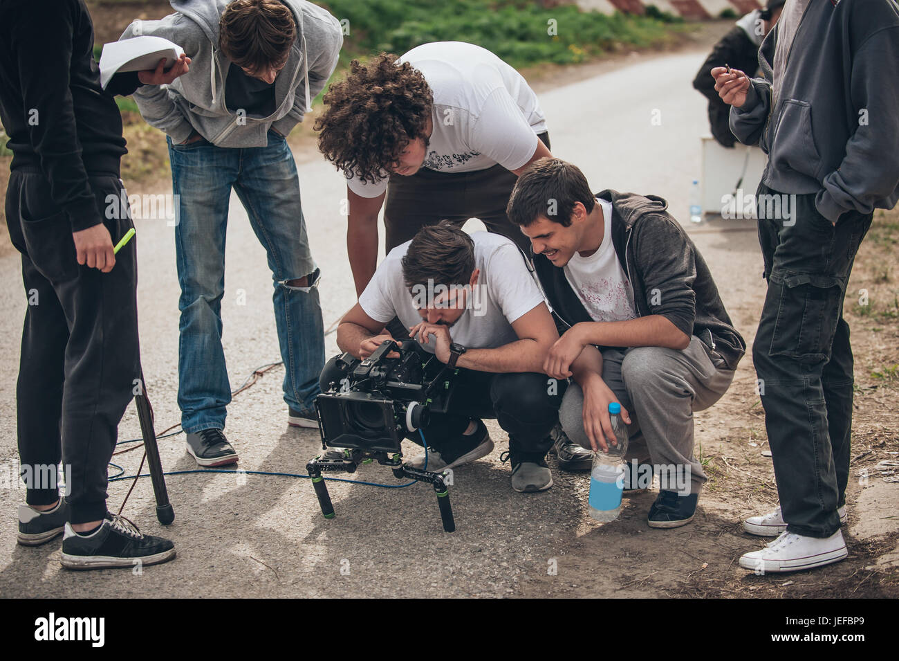 Behind the scene. Film crew team filming movie scene on outdoor ...