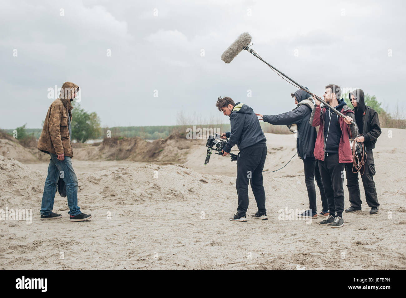 Behind the scene. Film crew team filming movie scene on outdoor ...