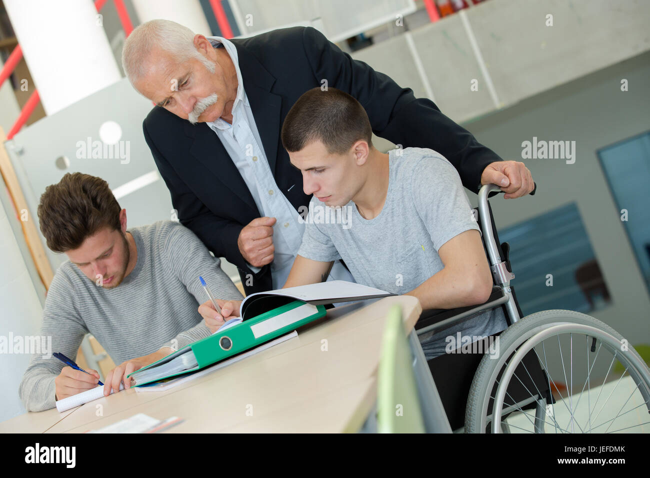 support class for student on wheelchair Stock Photo - Alamy