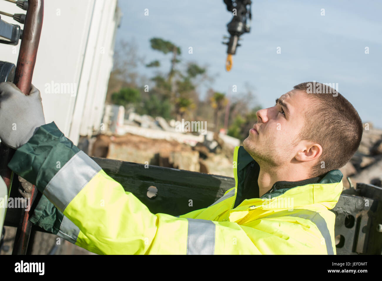 construction worker with pipe at building site Stock Photo - Alamy