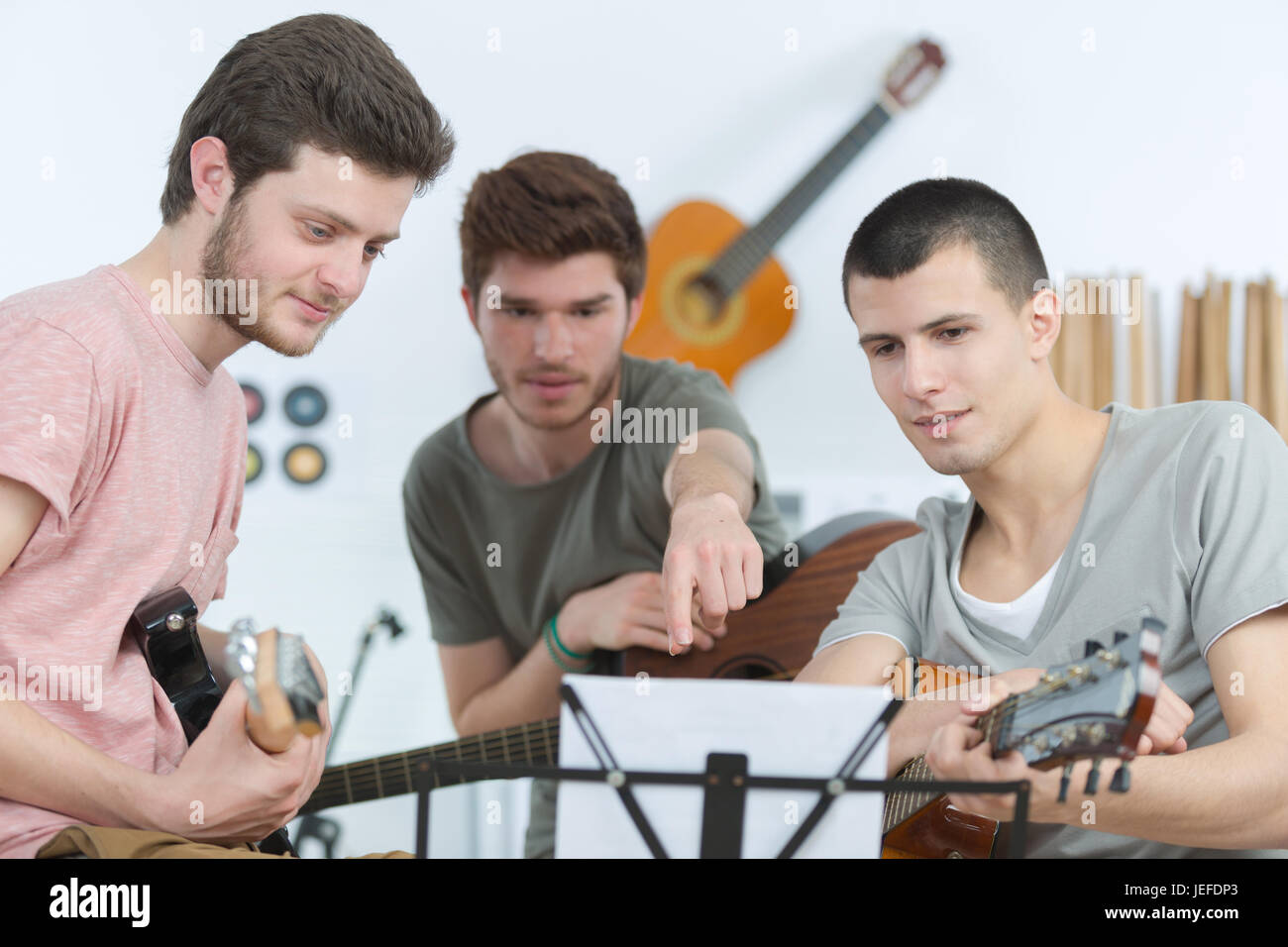 Band members backstage hi-res stock photography and images - Alamy
