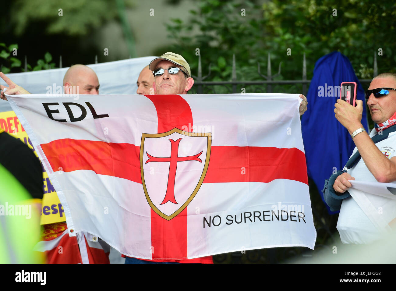 People take part in an English Defence League (EDL) protest in central ...