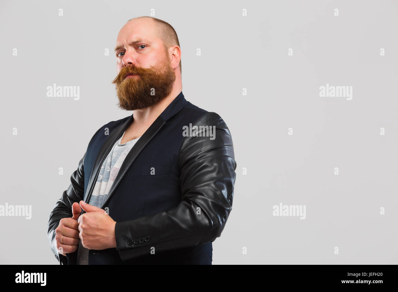 Brutal man with ginger beard Stock Photo - Alamy