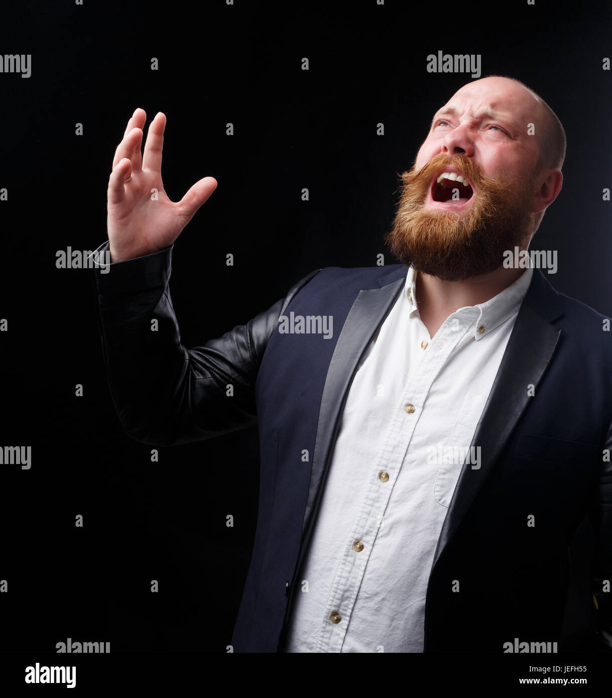 Man with ginger mustache sings Stock Photo - Alamy