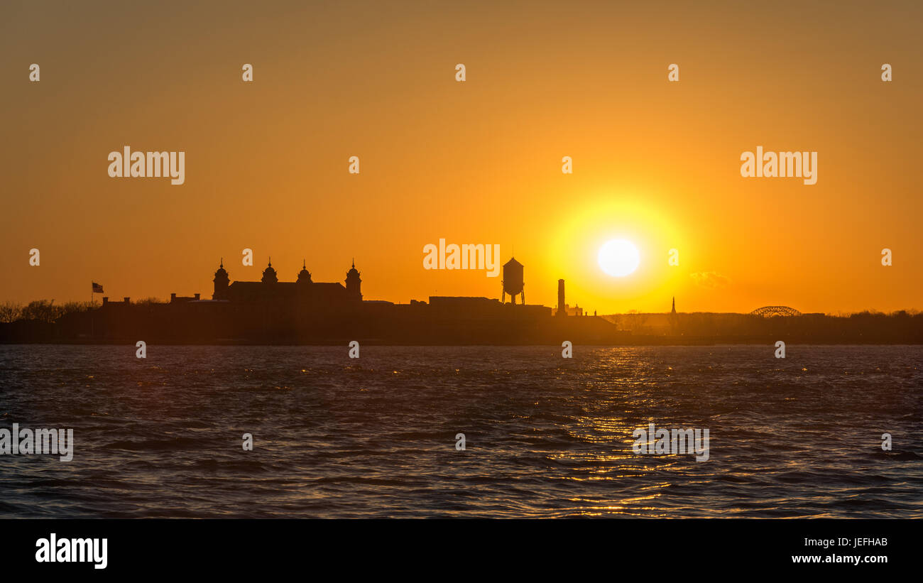 Sunset Over Ellis Island Stock Photo - Alamy