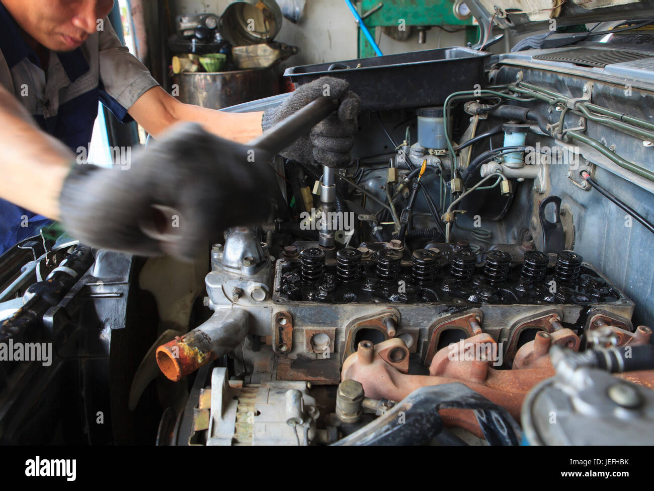 hand repair and maintenance top of cylinder diesel engine block of ...