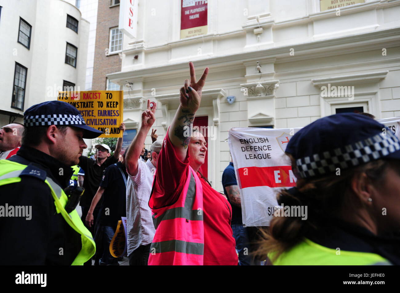 People take part in an English Defence League (EDL) protest in central ...