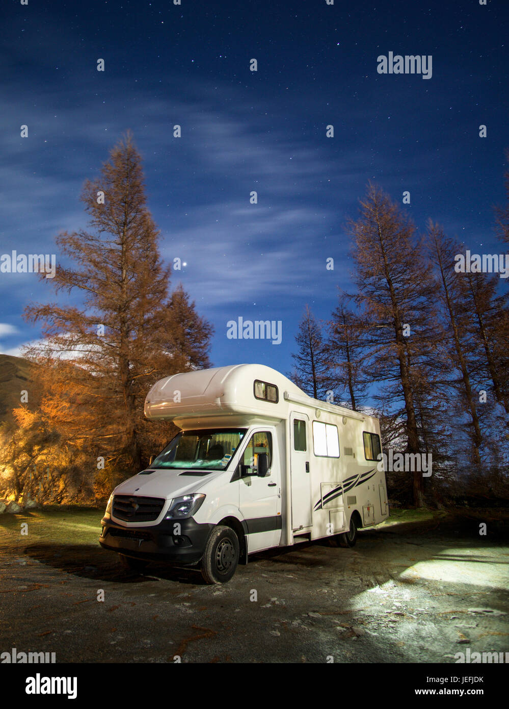 Motorhome in the night Stock Photo - Alamy
