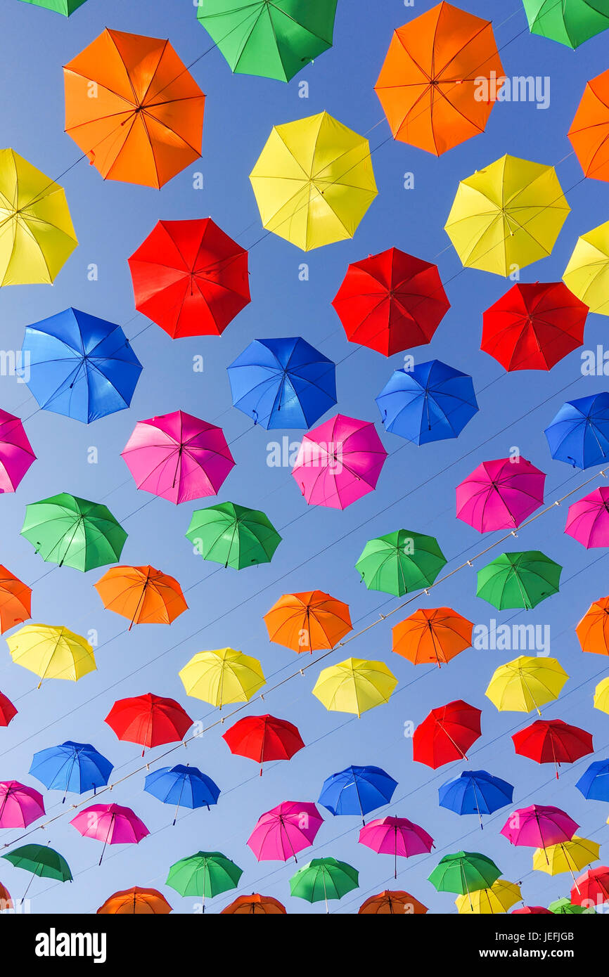 Colorful umbrellas flying in air hi-res stock photography and images ...