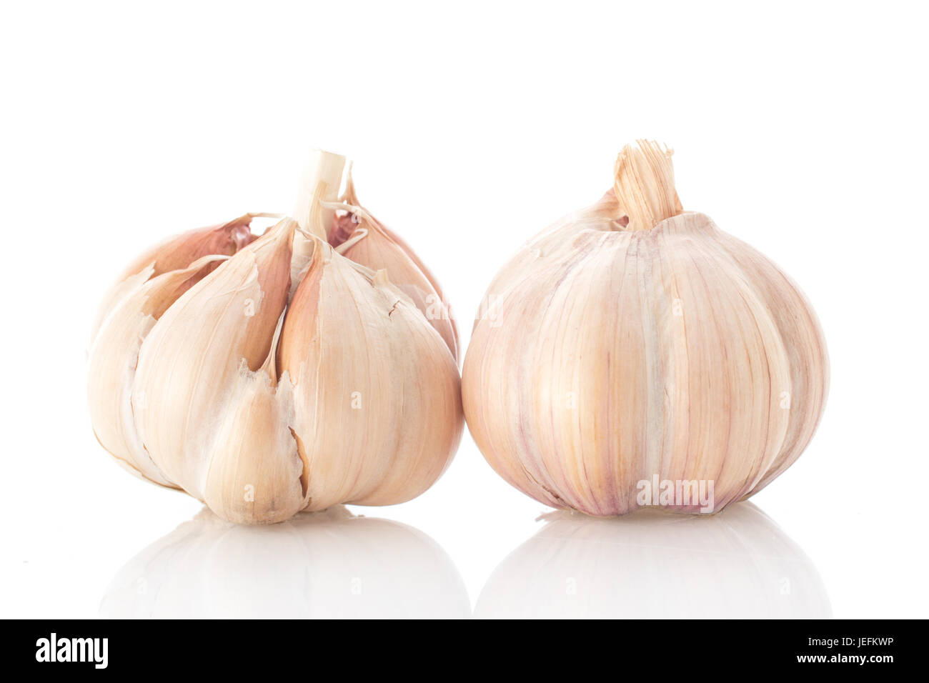 Garlic bulb isolated on white background Stock Photo - Alamy