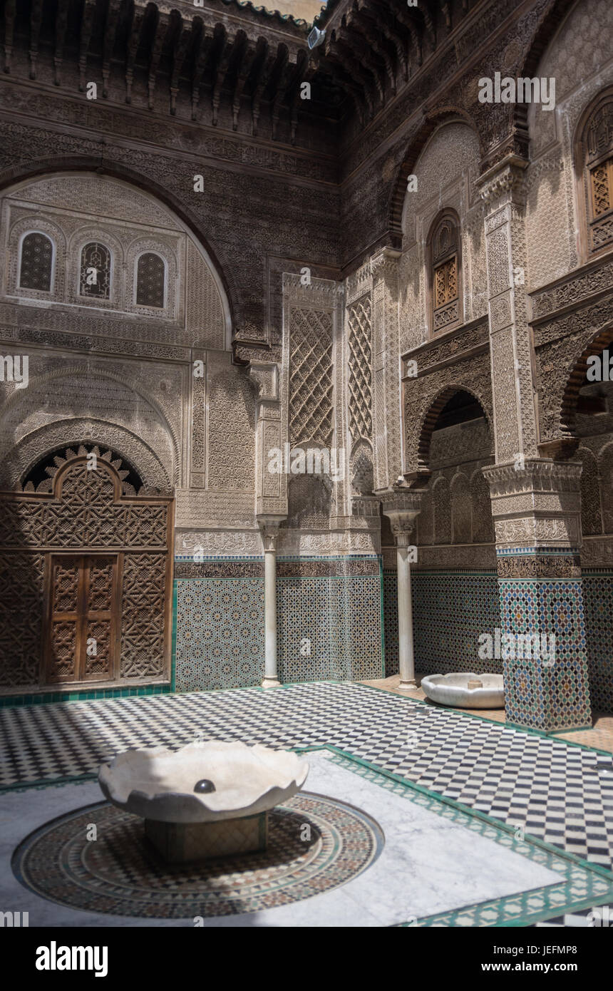 Fez, Morocco - May 9, 2017: Courtyard of Al-Attarine Madrasa is a ...