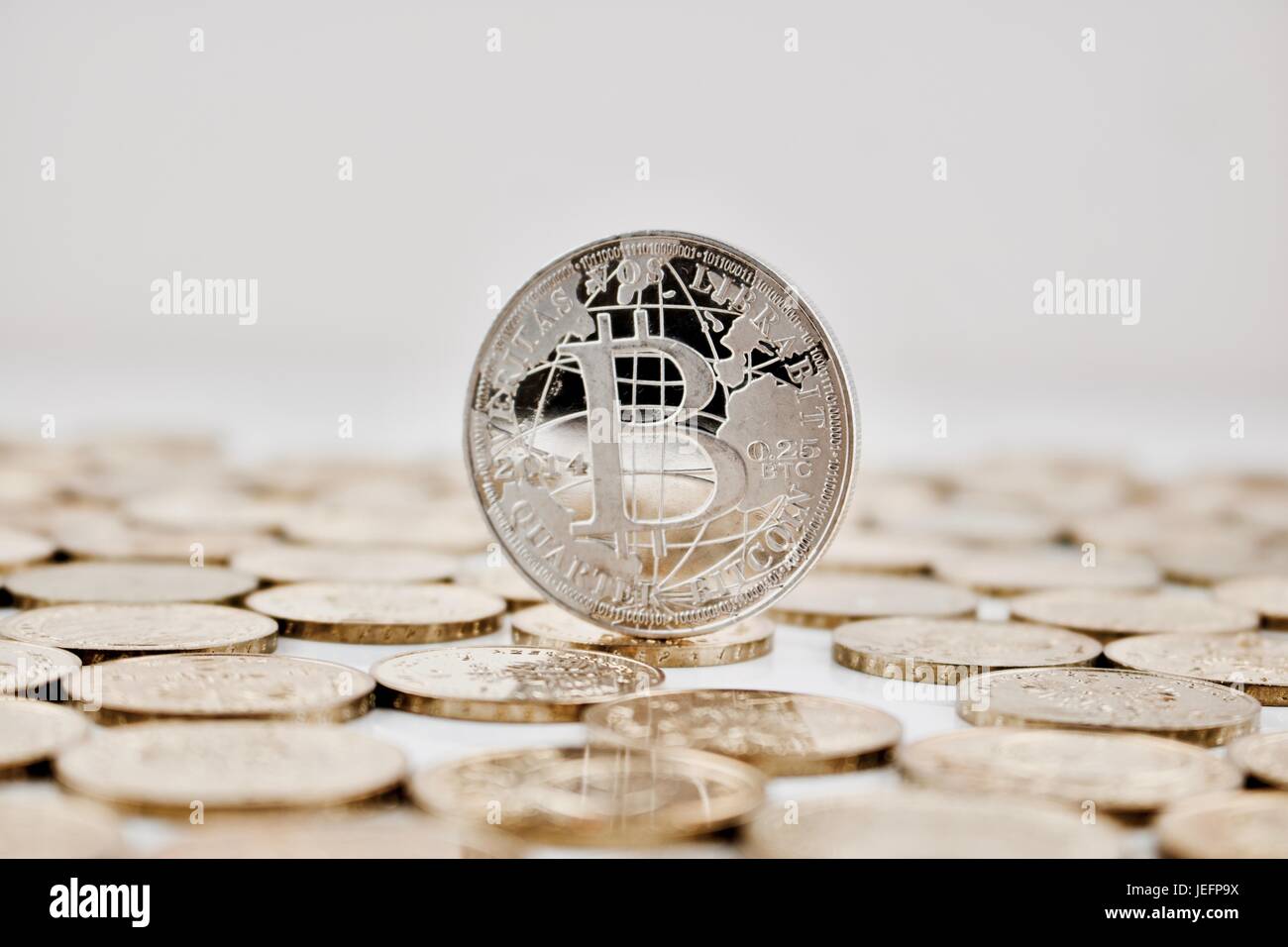 Digital currency physical silver bitcoin coin on the gold money Stock ...