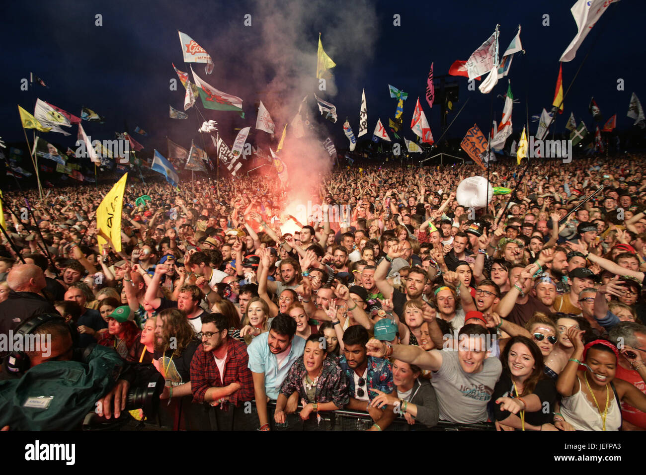 Fans watch Foo Fighters perform on The Pyramid Stage at the Glastonbury ...