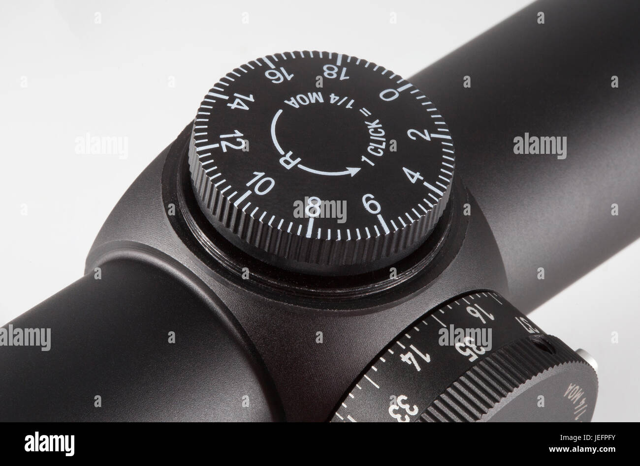 Dial used to adjust windage on a rifle scope Stock Photo - Alamy