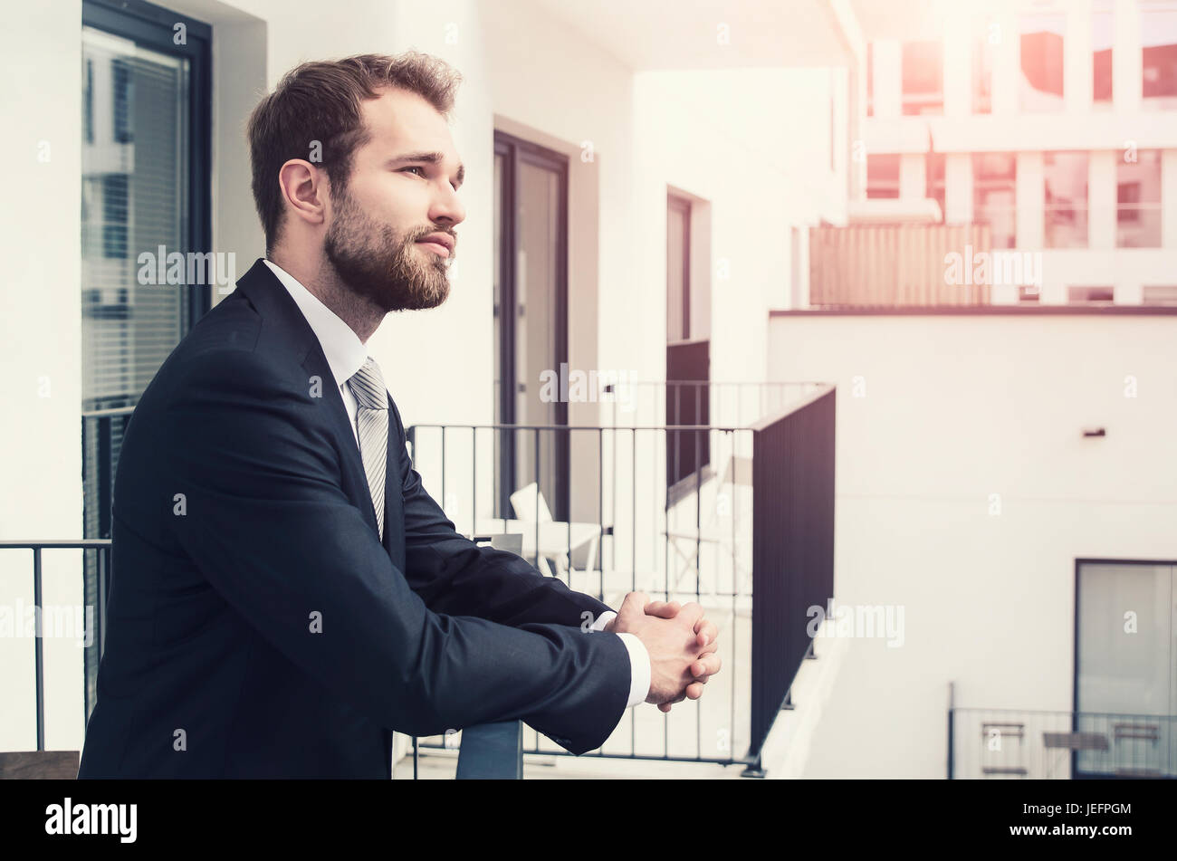 People looking from their balcony hi-res stock photography and images ...