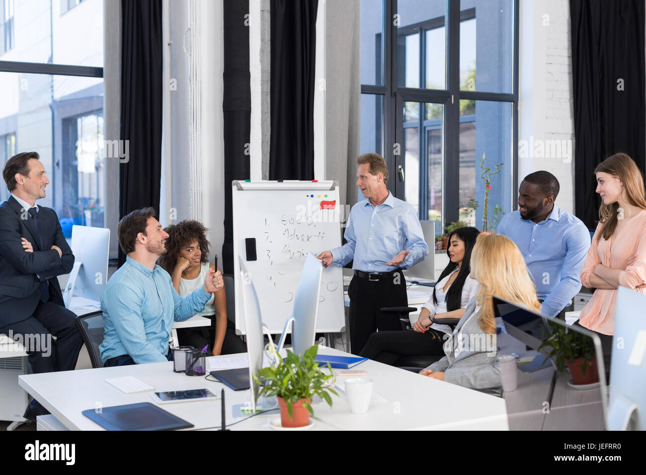 Business Presentation, Businessman Leading Meeting To Businesspeople ...
