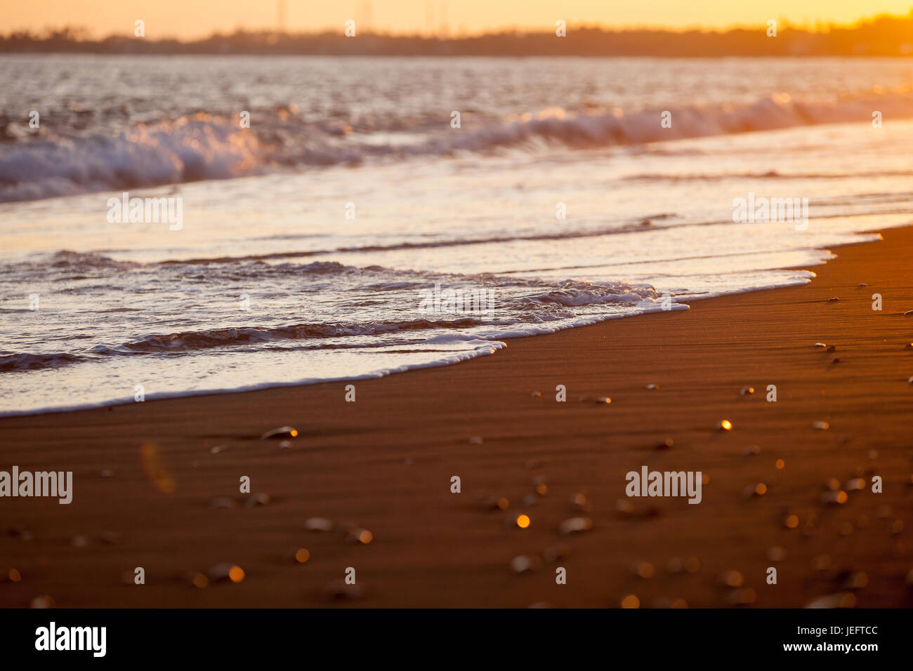 Sandy beach sun rays hi-res stock photography and images - Alamy