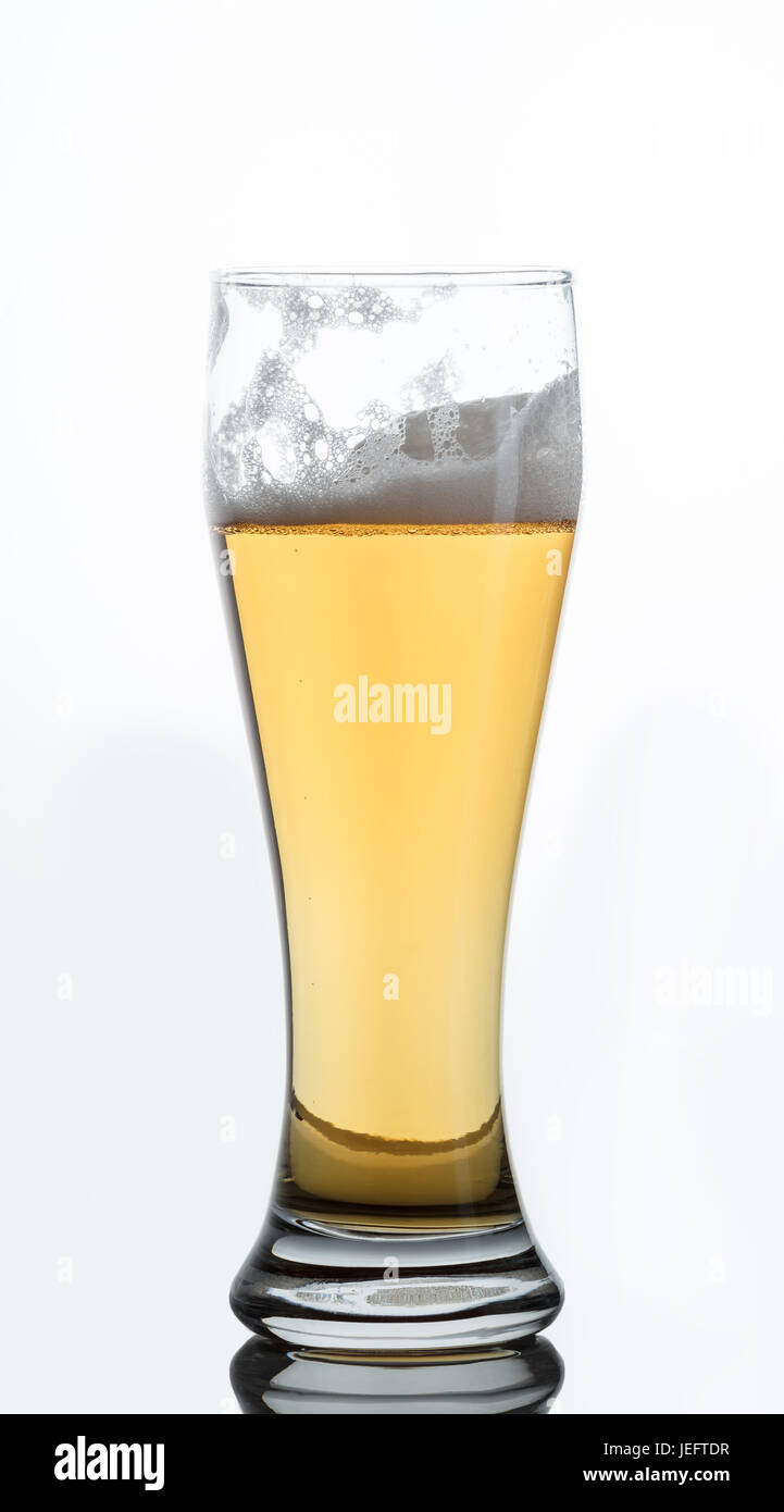 Glass of light beer on white background Stock Photo - Alamy