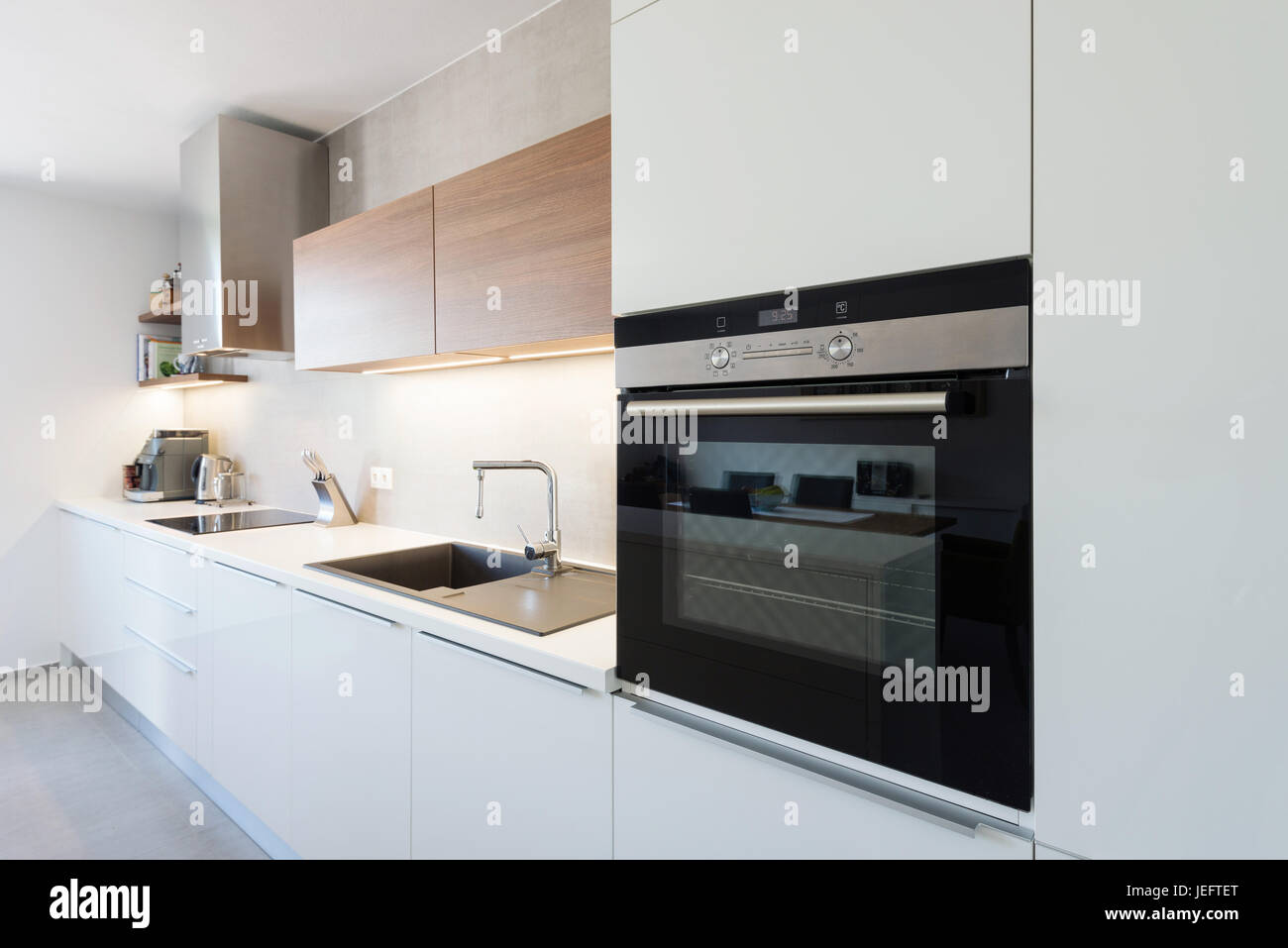 Modern kitchen interior with with built-in appliances Stock Photo - Alamy