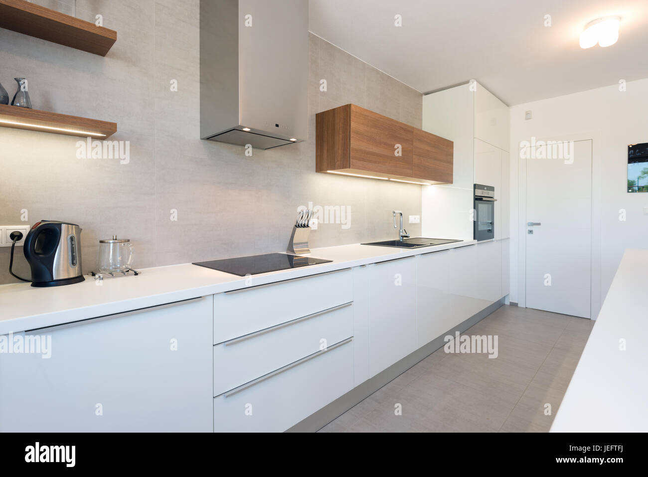 Modern kitchen interior with with built-in appliances Stock Photo - Alamy