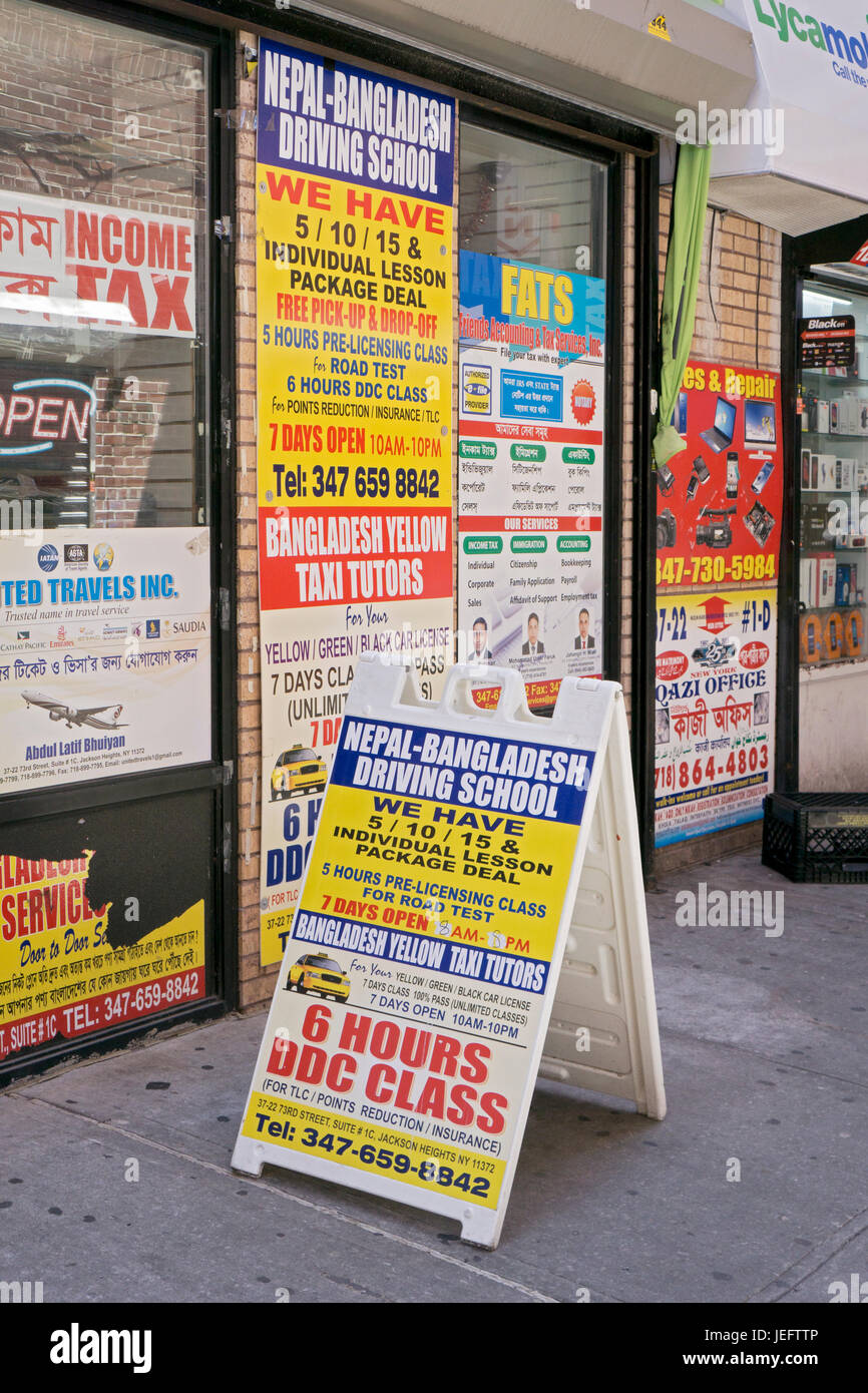 Bilingual advertising signs in an alleyway off 75th st. in Jackson ...
