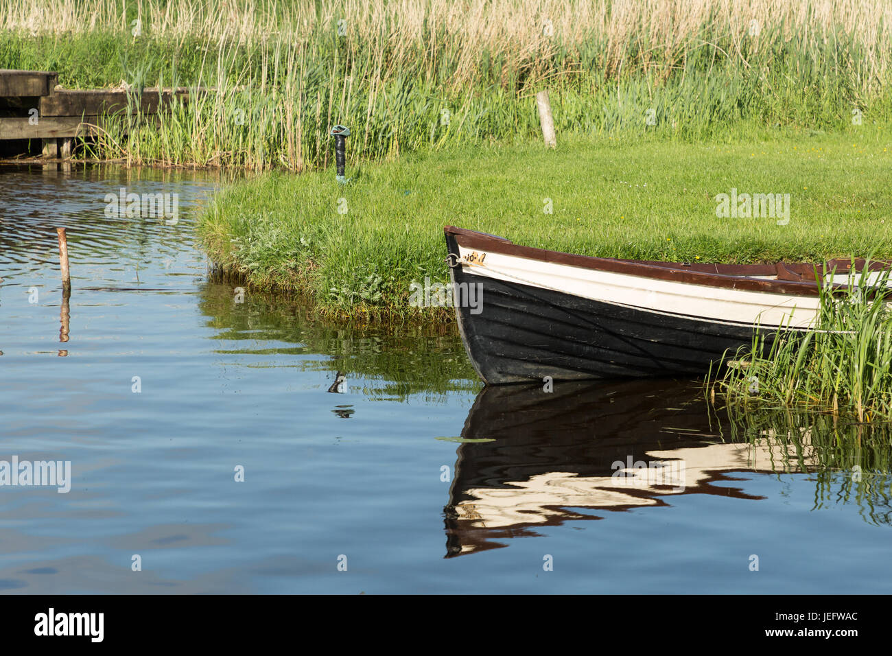 rowboat moored on the banks of the River Shannon Stock Photo - Alamy